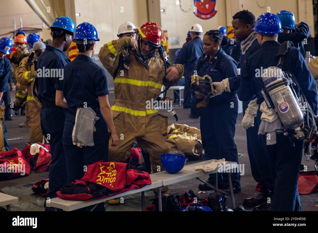 NORFOLK NAVAL SHIPYARD (August 28, 2024) Sailors assigned to the Nimitz-class aircraft carrier ...