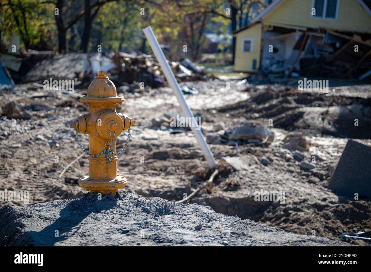 Structural damage is seen behind a fire hydrant in Old Fort, Oct. 24 ...