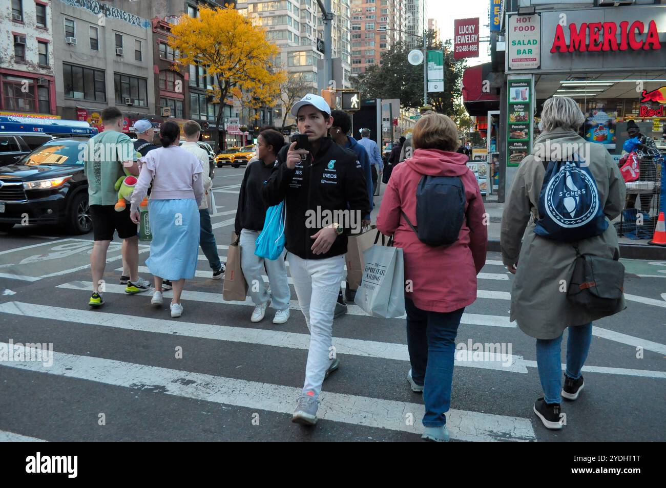 People walk down the street in Manhattan, New York City Stock Photo - Alamy