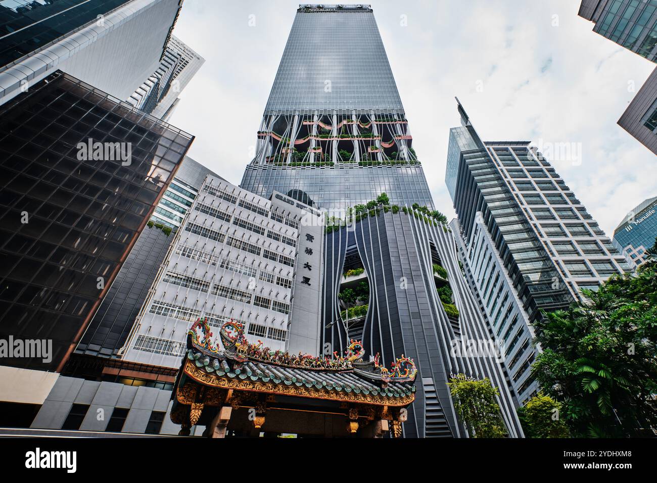 Singapore - August 12, 2024: CapitaSpring skyscraper with unique ...