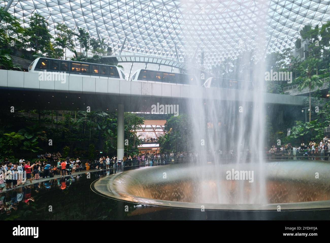 Singapore - August 12, 2024: Indoor tropical garden and Waterfall at ...