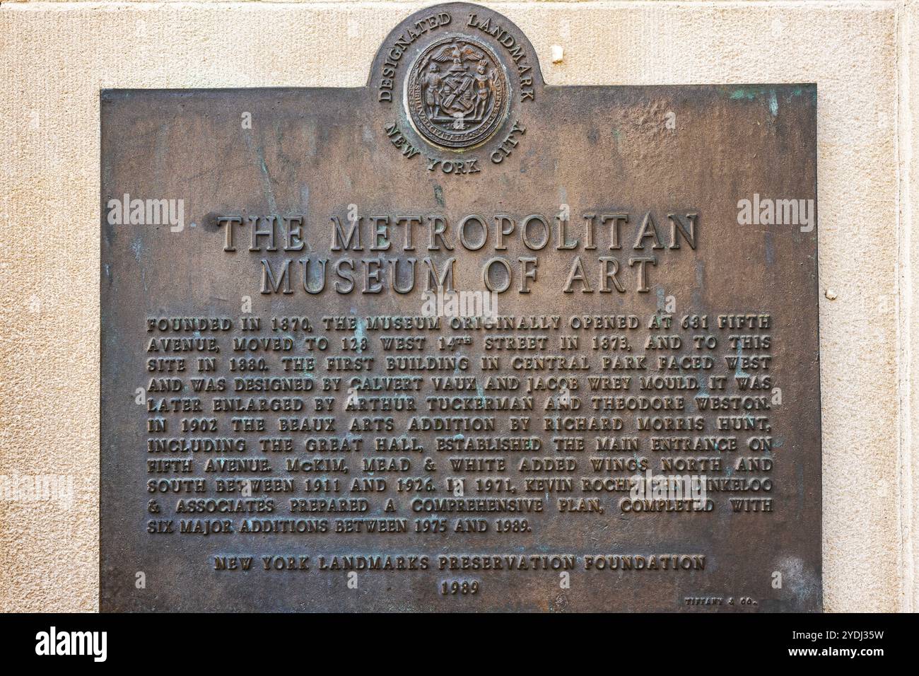 Historic plaque detailing foundation and architectural evolution of ...