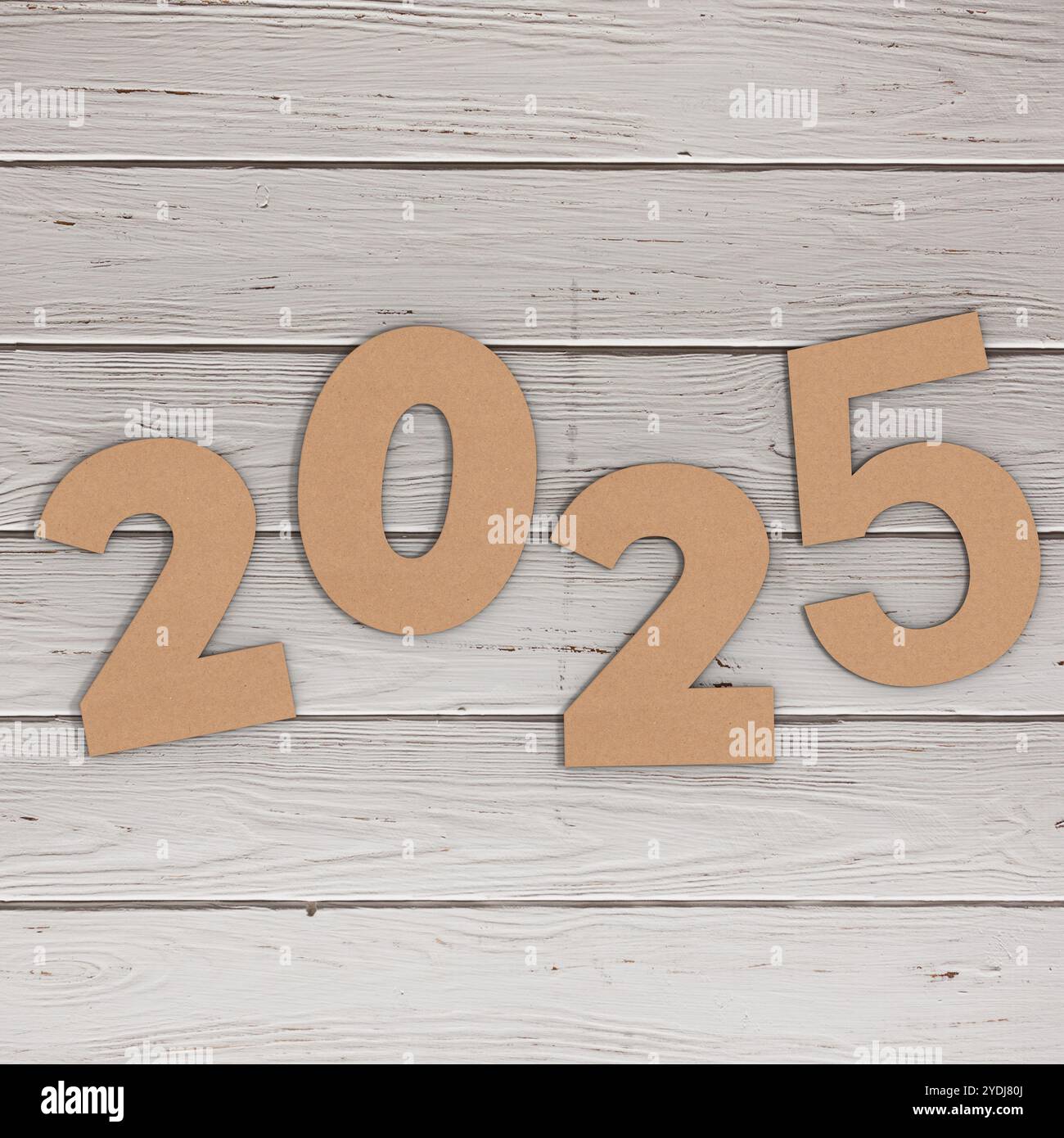 Cardstock Numbers 2025 Happy New Year Sign over wooden table background ...