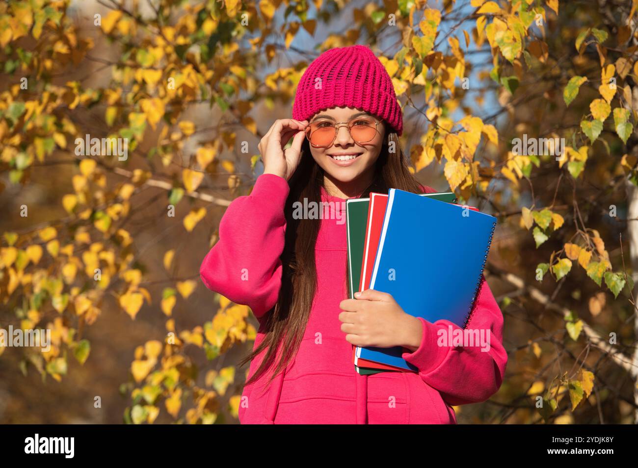 autumn nature in september. school girl study in autumn. education in ...