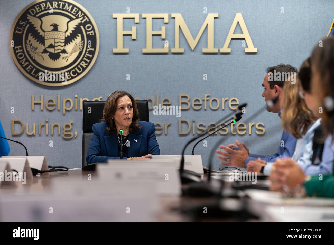 Vice President Kamala Harris receives a briefing on the impact and ...