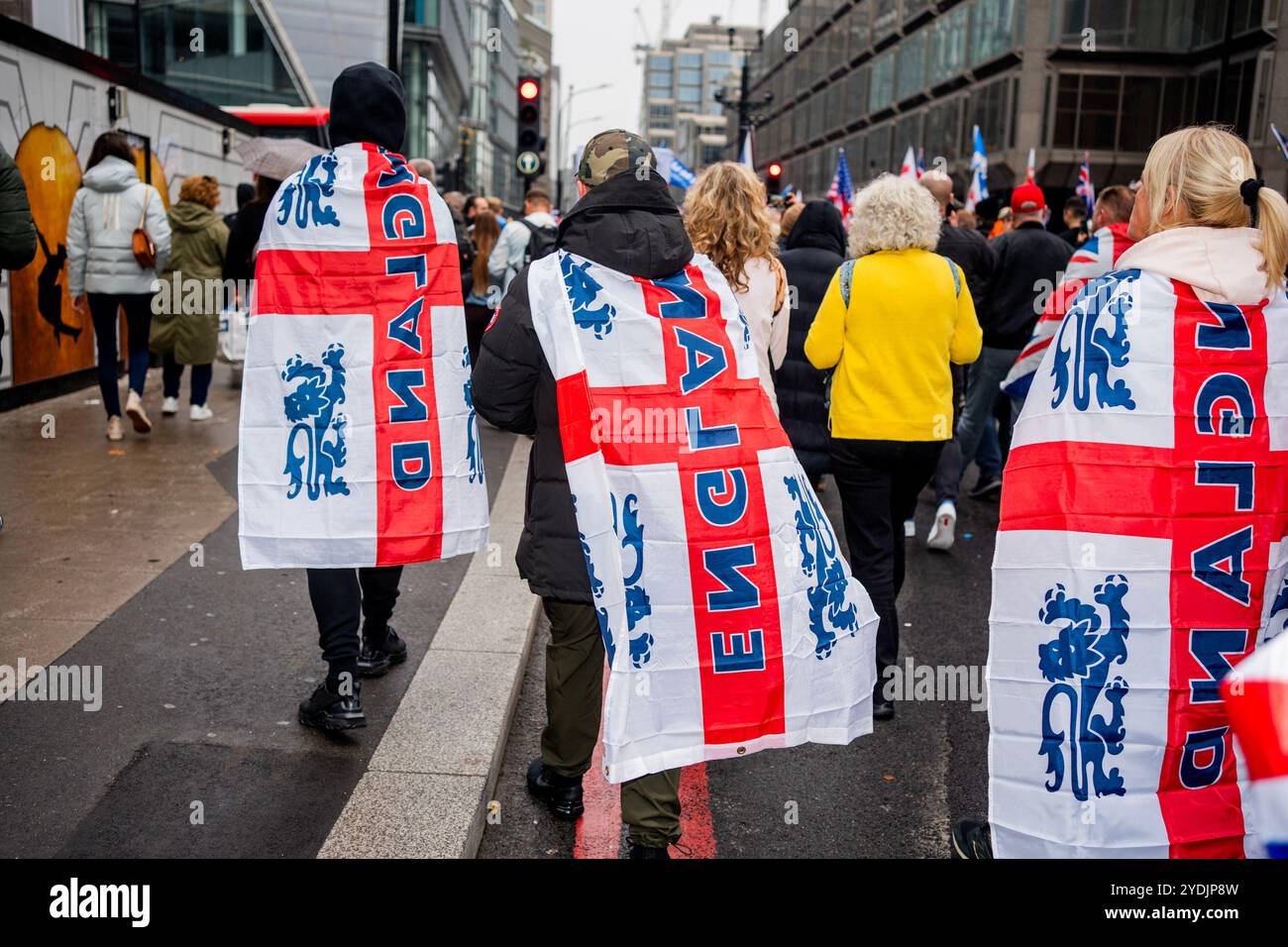 London, UK. 26th Oct, 2024. Protestors are wrapped with flags during ...