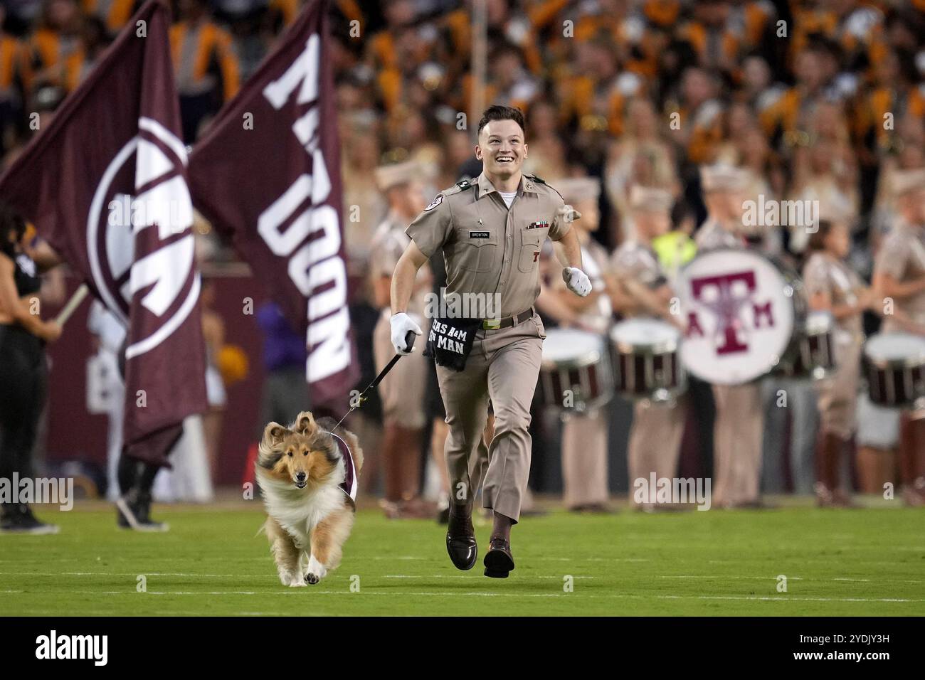Reveille X and her handler Corps of Cadets member Josh Brewton run on ...