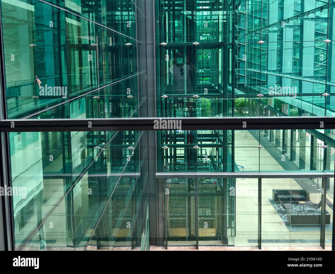 A modern tall building that features a significant amount of glass ...