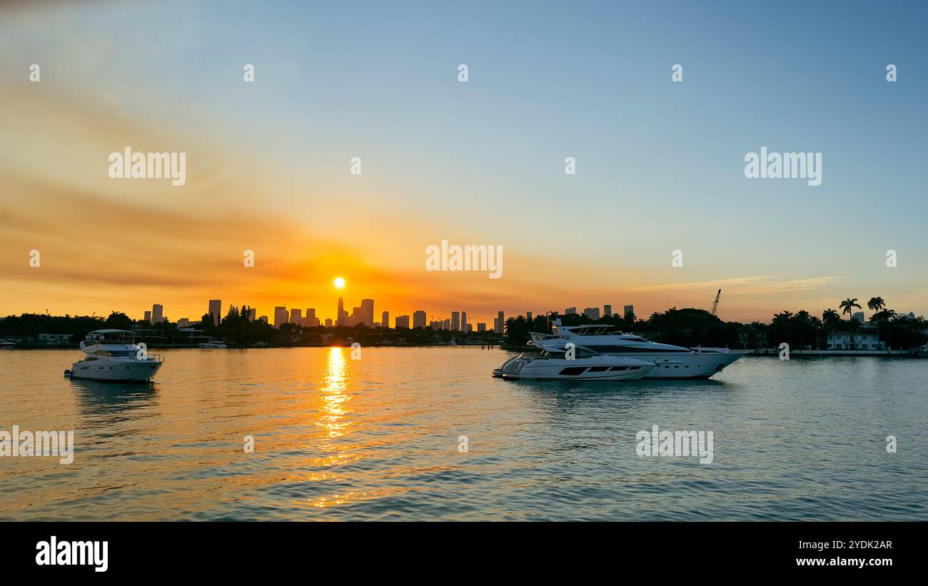 Two boats in front of the downtown Miami skyline during a beautiful ...