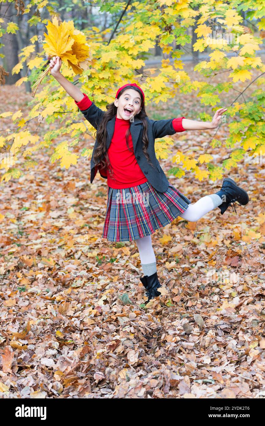 Girl in fall park wear uniform. Teen autumn uniform style. Autumn girl ...