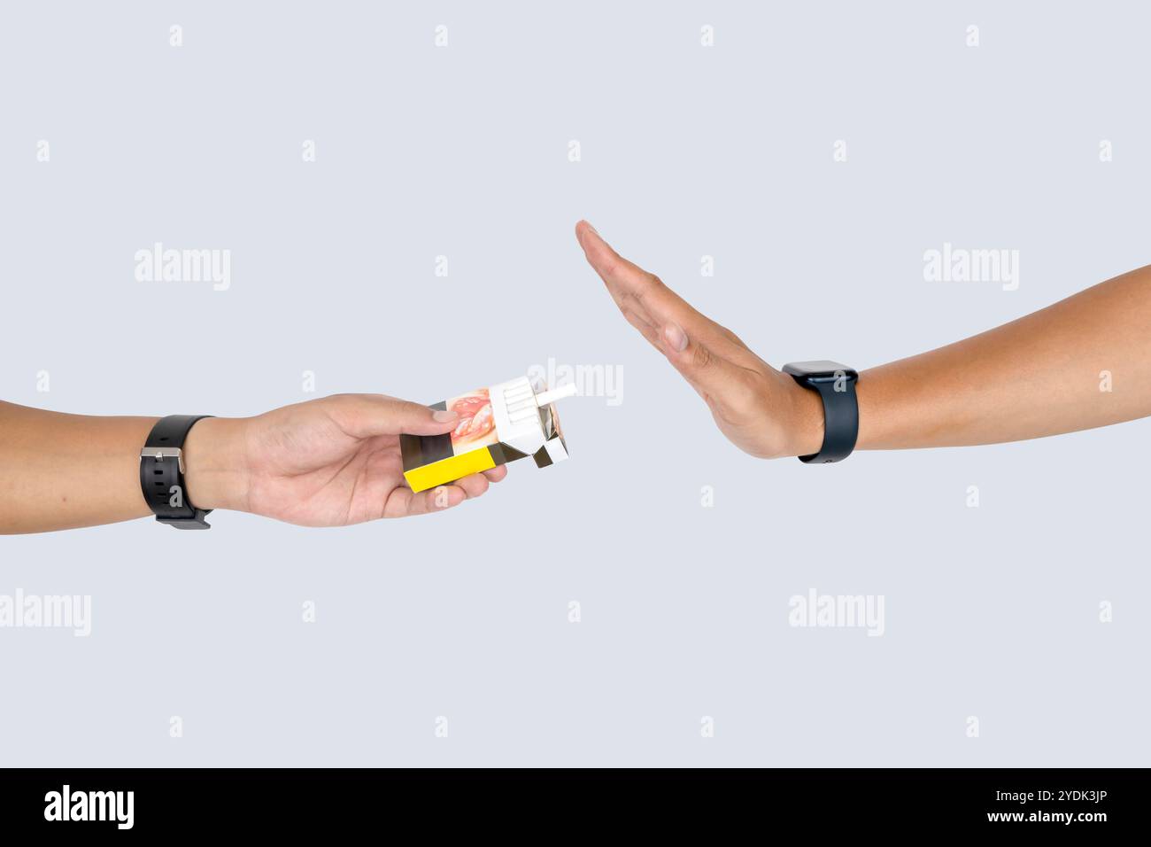 Anti-smoking concept featuring a hand blocking a cigarette pack offer ...