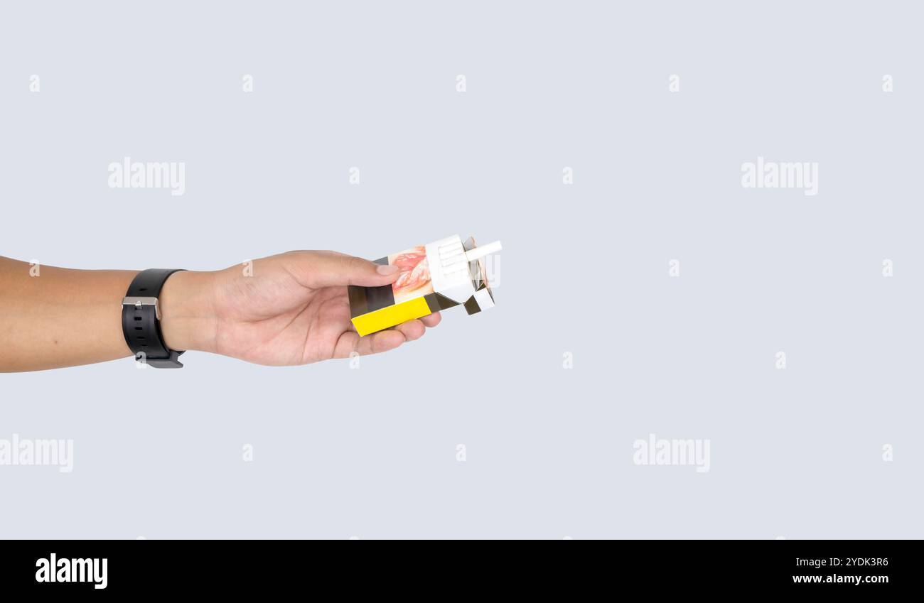 Anti-smoking concept featuring a hand blocking a cigarette pack offer ...