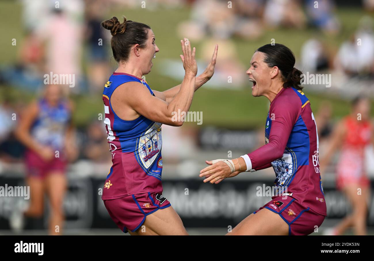 Brisbane, Australia. 27th Oct, 2024. Cathy Svarc (left) of the Lions ...