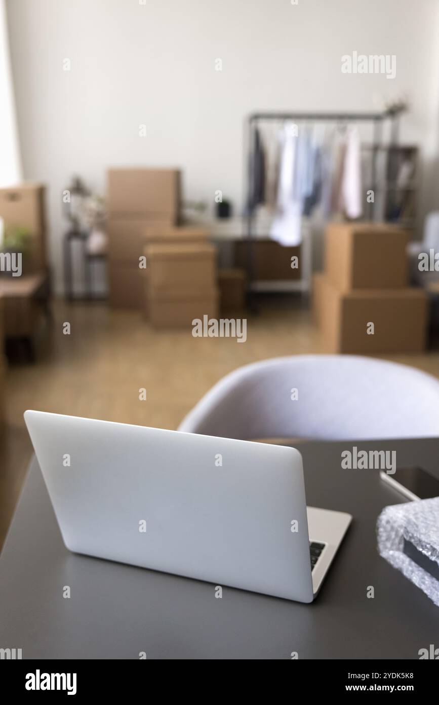 Laptop placed on work table of small internet business owner Stock ...