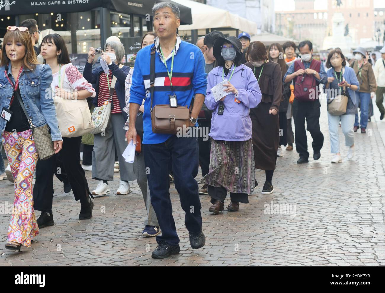 Many groups of Asian tourists visit the city of Milan, the world ...