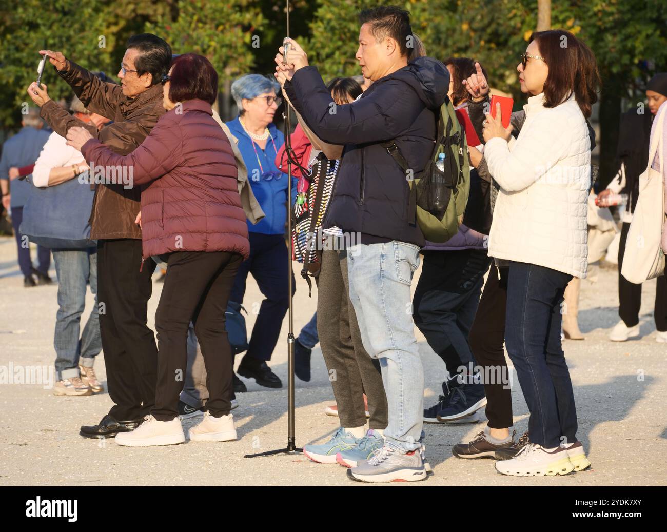 Many groups of Asian tourists visit the city of Milan, the world ...