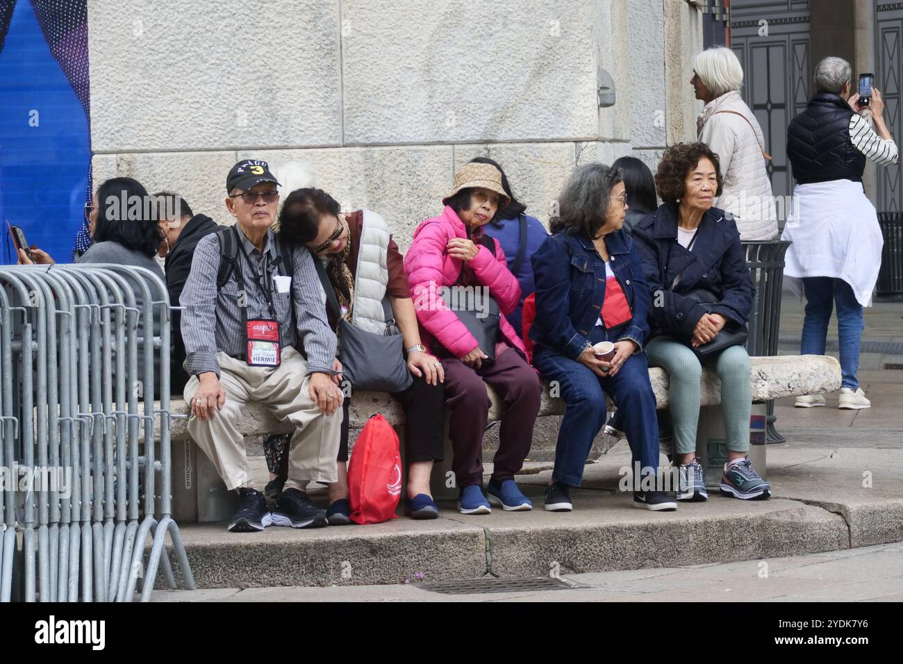 Many groups of Asian tourists visit the city of Milan, the world ...