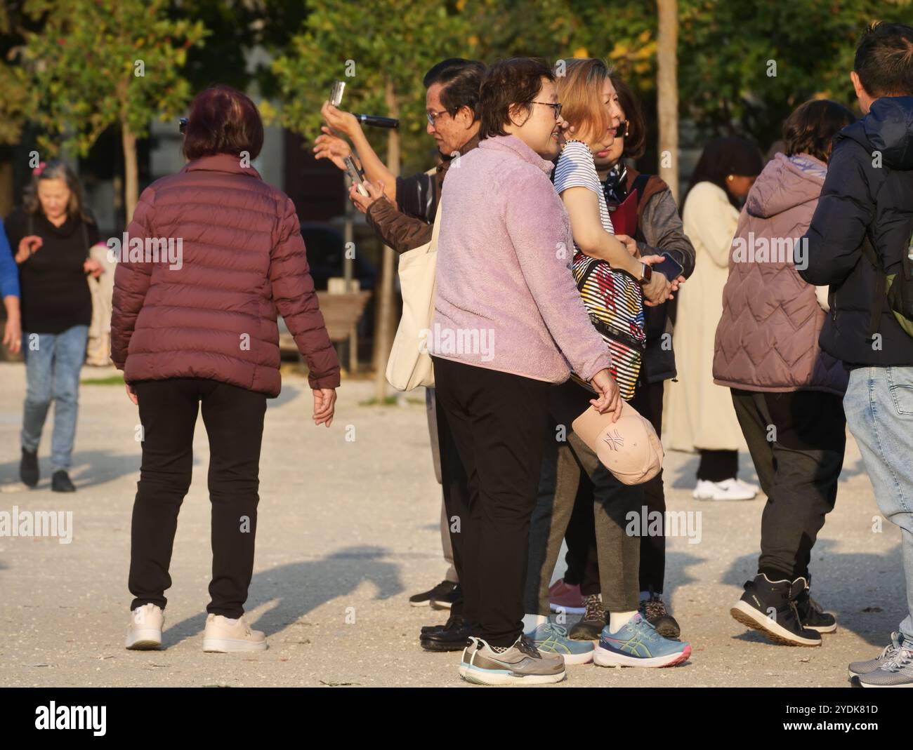 Many groups of Asian tourists visit the city of Milan, the world ...