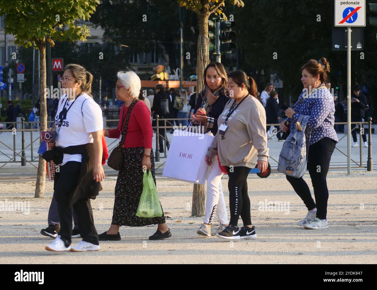 Many groups of Asian tourists visit the city of Milan, the world ...