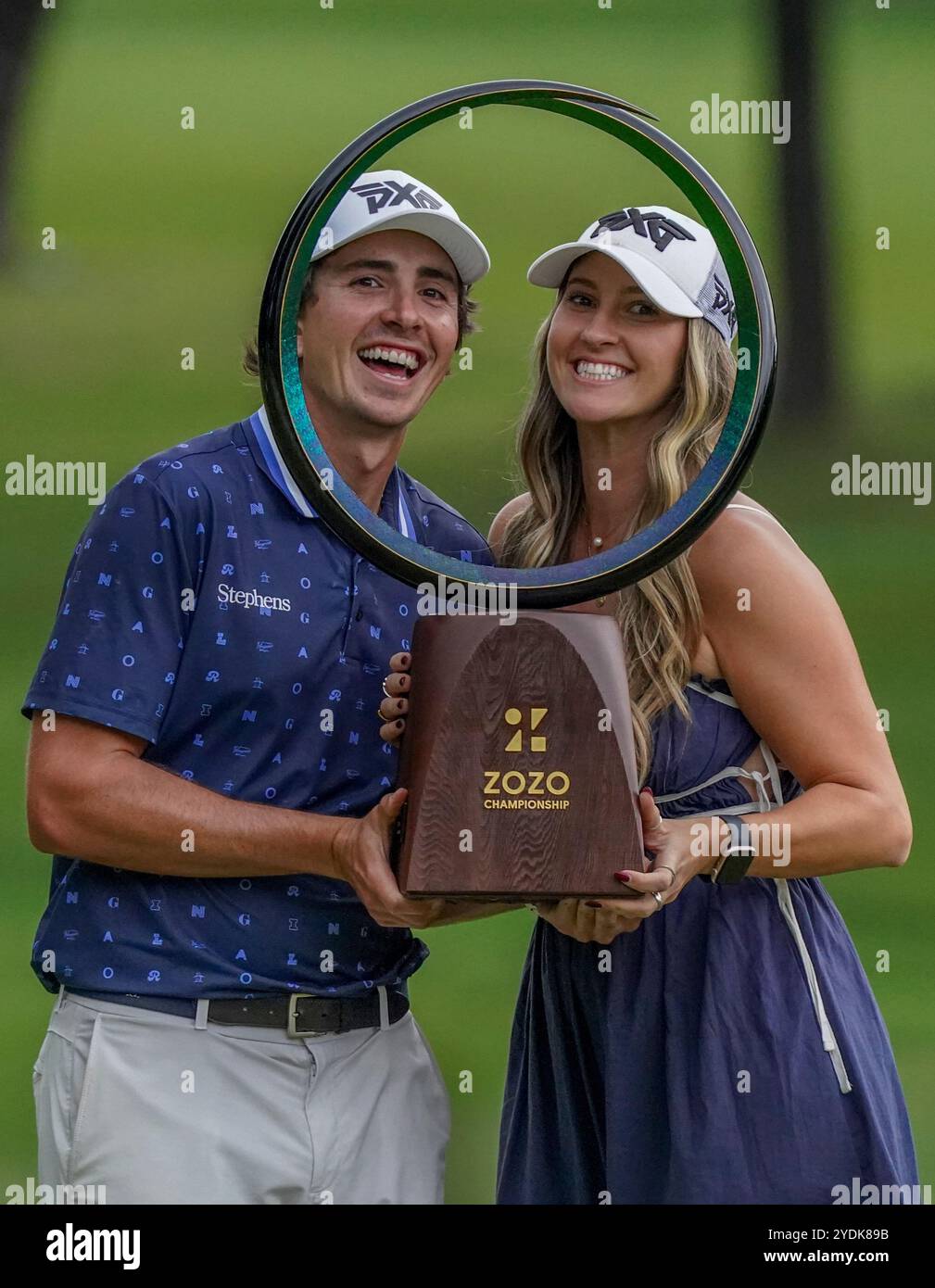 Nico Echavarria of Colombia, left, along with his girlfriend, poses ...