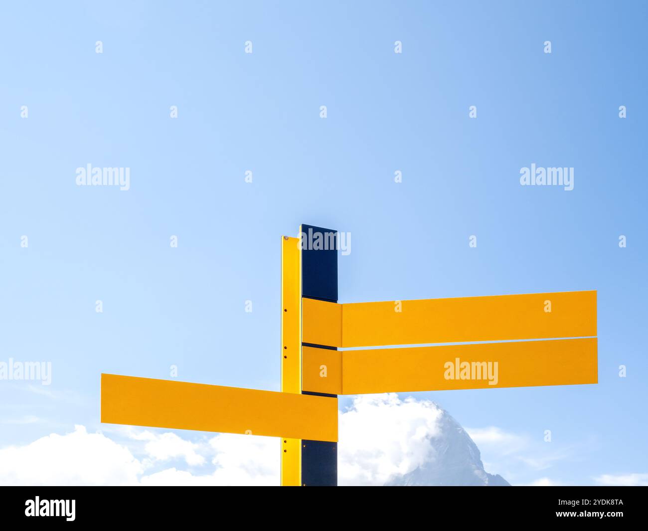 Yellow outdoor signpost in different directions with empty space for ...