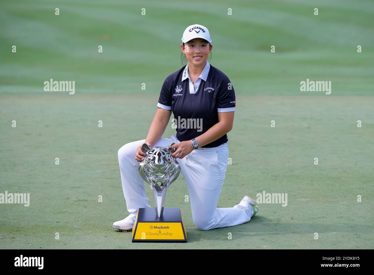 Yin Ruoning of China poses with the winning trophy during the awards ...