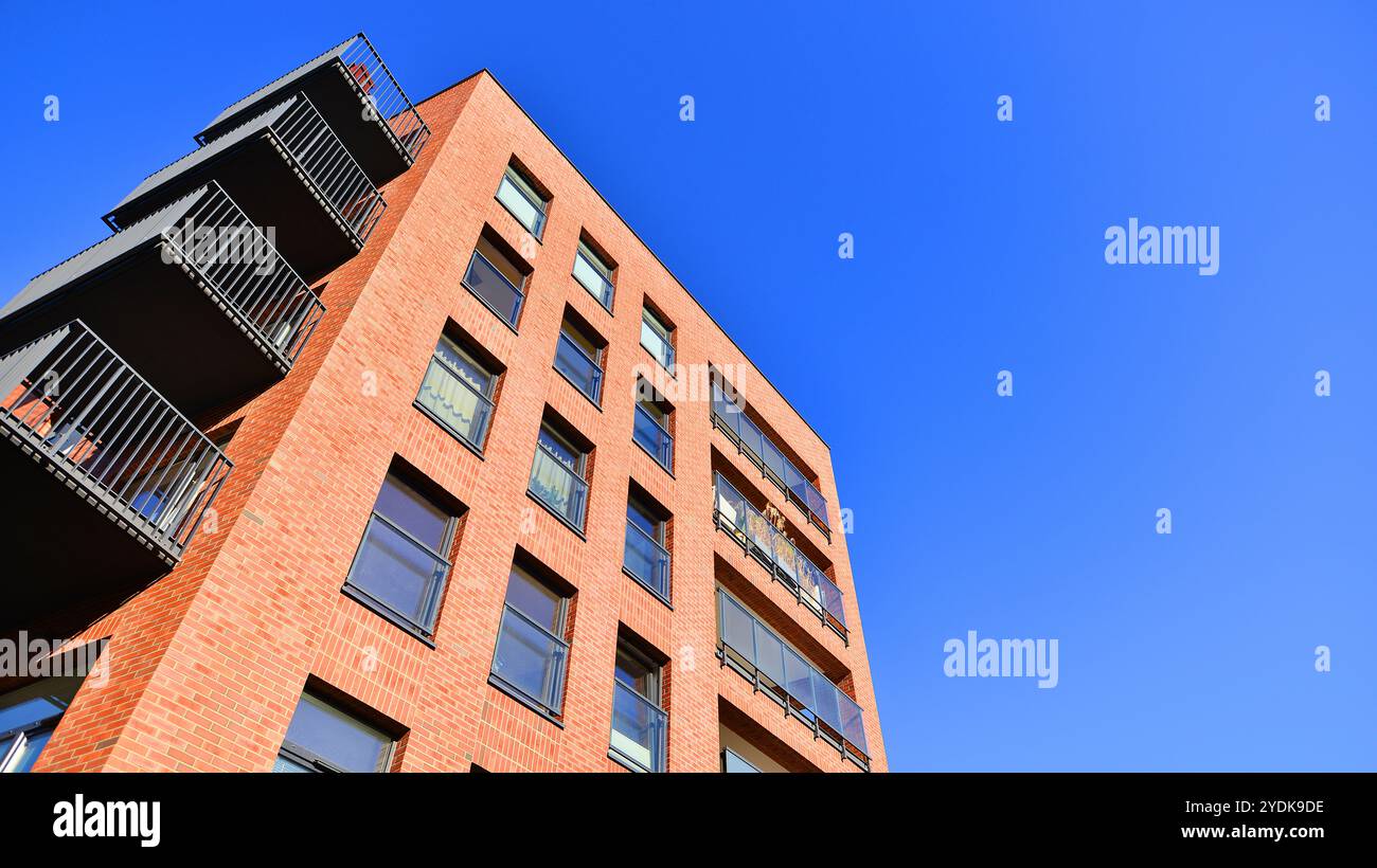 Modern multifamily building in a european city. Walls made of concrete ...