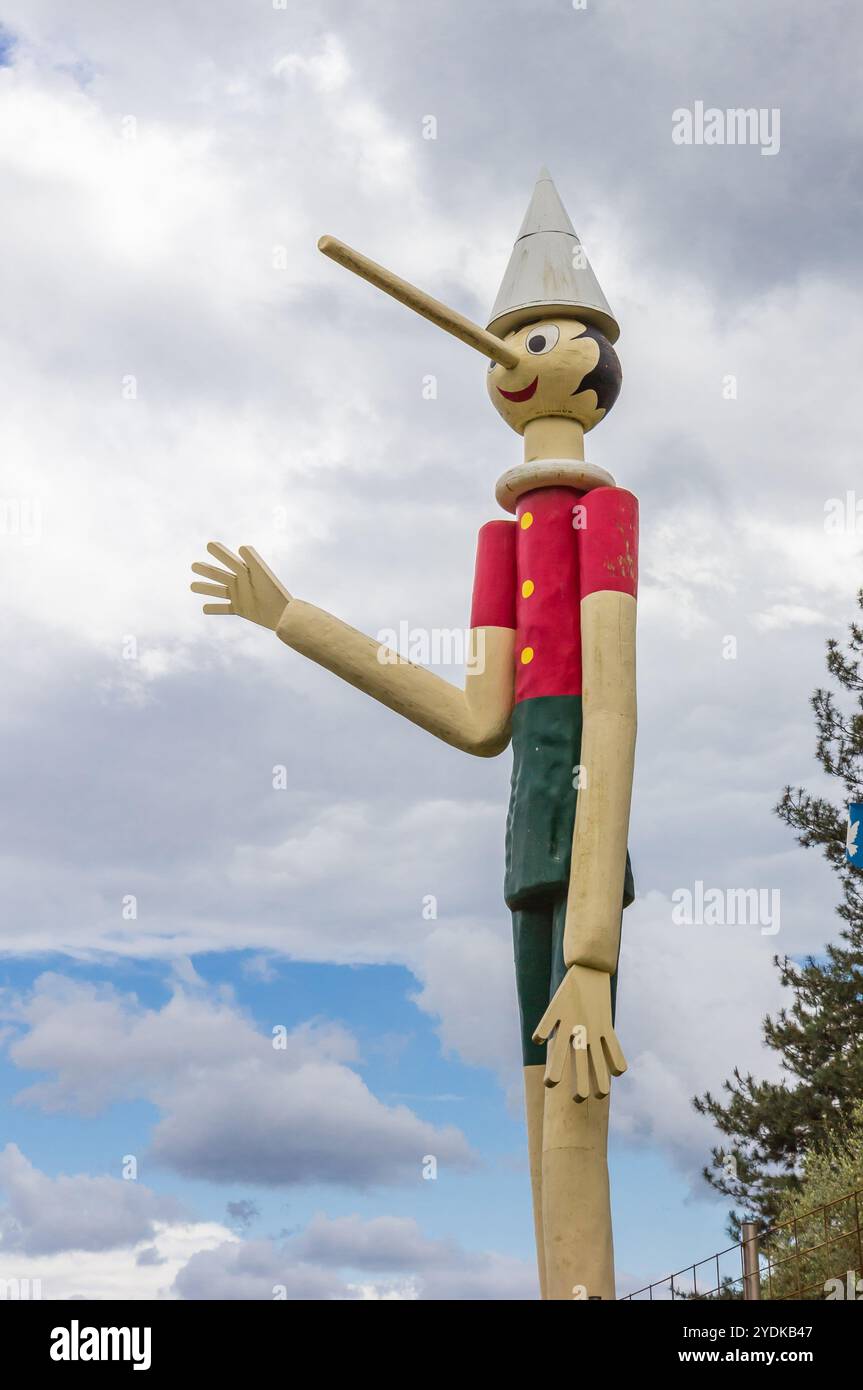 Statue of wooden boy Pinocchio in Collodi, Italy Stock Photo - Alamy