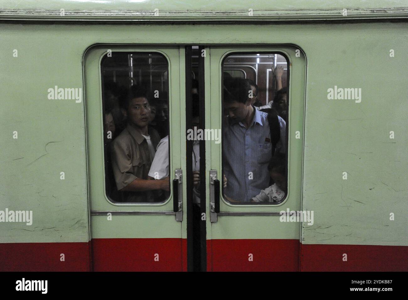 09.08.2012, Pyongyang, North Korea, Asia, Passengers stand in a full ...