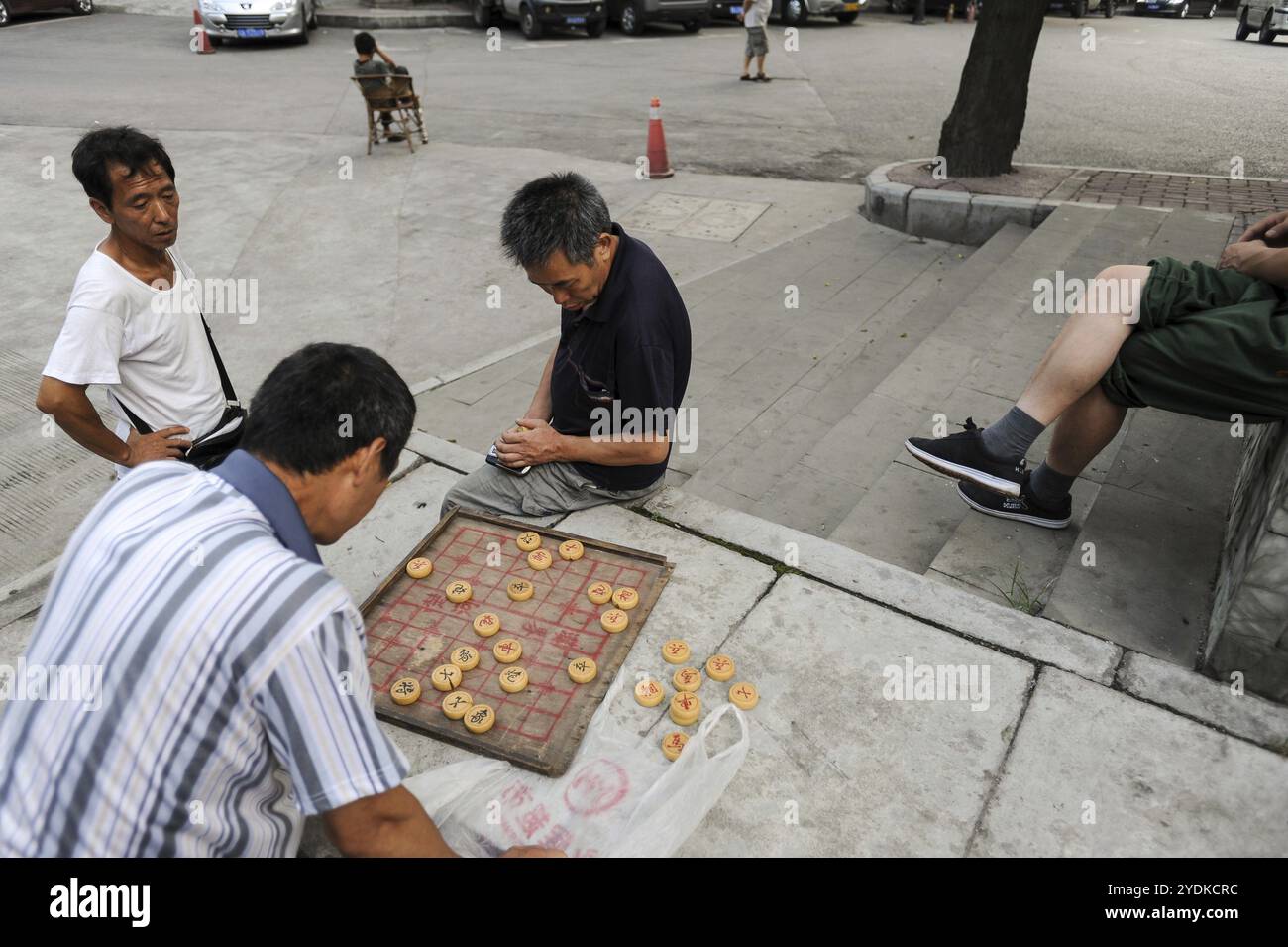 01.08.2012, Chongqing, China, Asia, Men playing Chinese chess, also ...