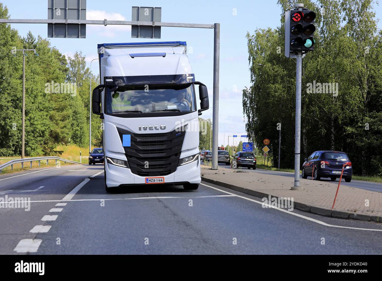 Front view of new, white Iveco S-Way NP freight transport truck waiting ...