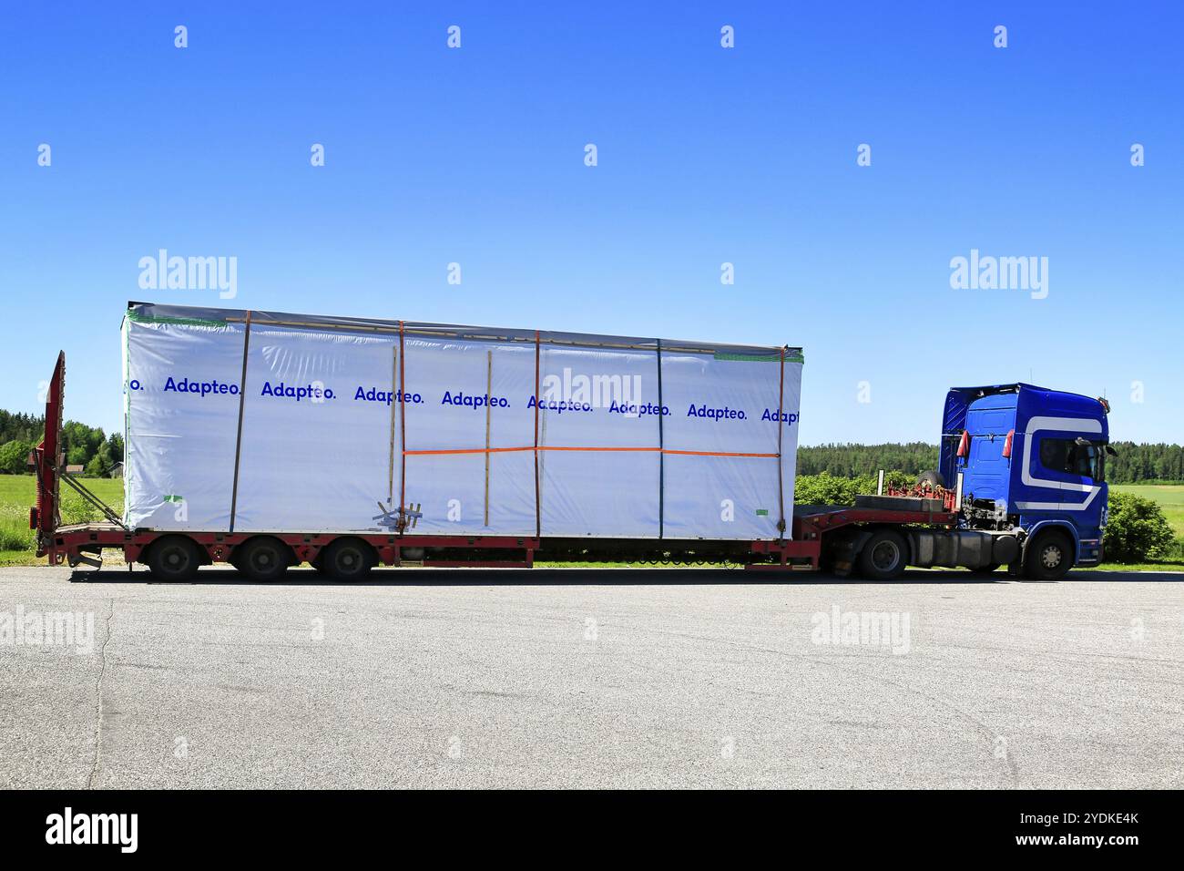 Oversize load transport of Adapteo prefabricated house module parked on ...