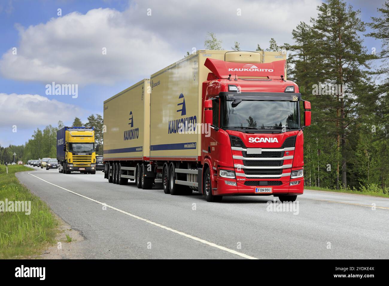 Red Scania R500 truck pulling temperature controlled multi axle trailer ...