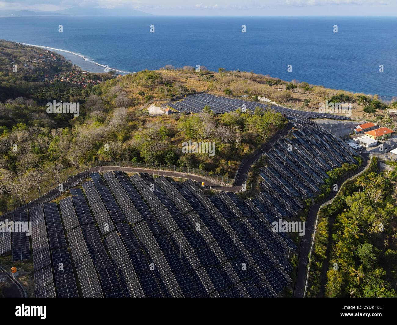 Nusa Penida, Aug 28 2024: A coastal hillside solar farm with rows of ...