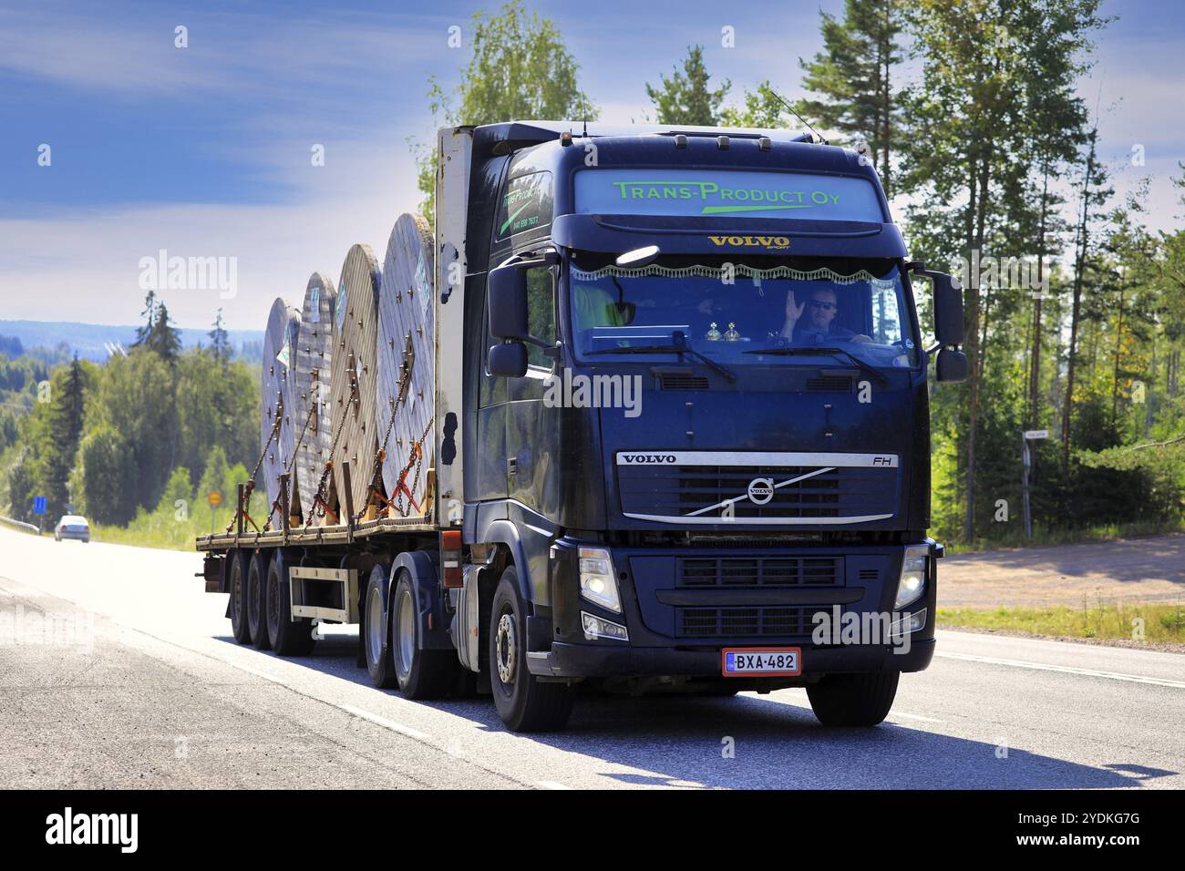Black Volvo FH truck of Trans-Product Oy transports REKA power cable ...