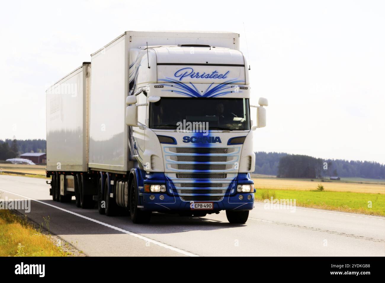 Beautiful blue and white Scania truck Piristeel pulls trailer on ...