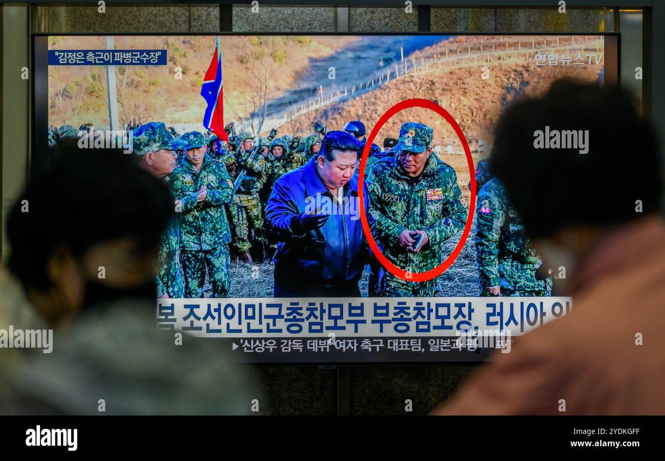 A 24-hour Yonhapnews TV broadcast at Yongsan Railway Station in Seoul ...