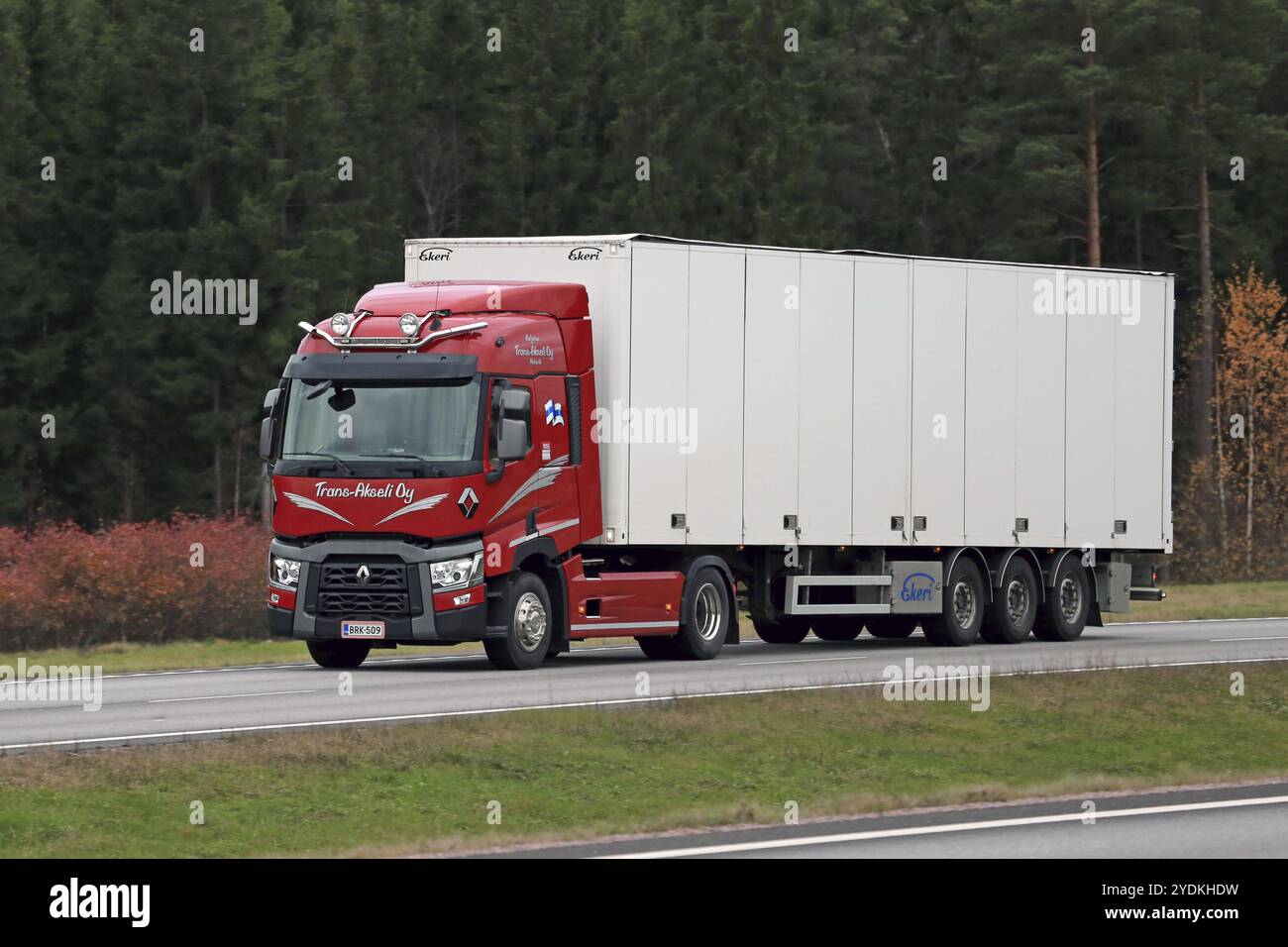 Red lorry moves along highway hi-res stock photography and images - Alamy