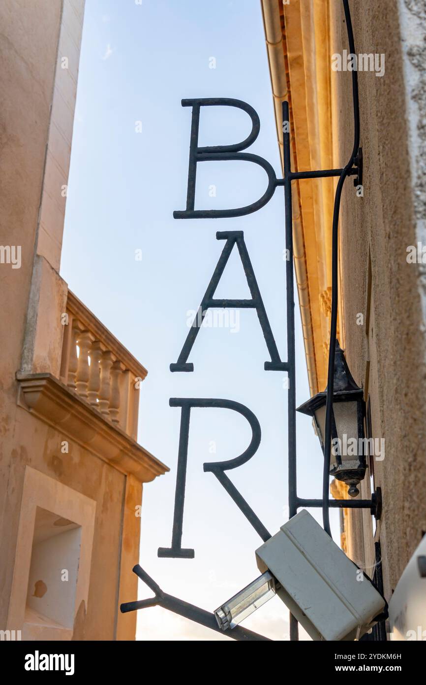 Close-up of the iron sign of a bar at dawn. Island of Mallorca, Spain ...