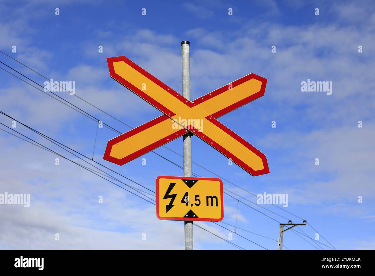 Unattended railway crossing sign informing of the height of overhead ...