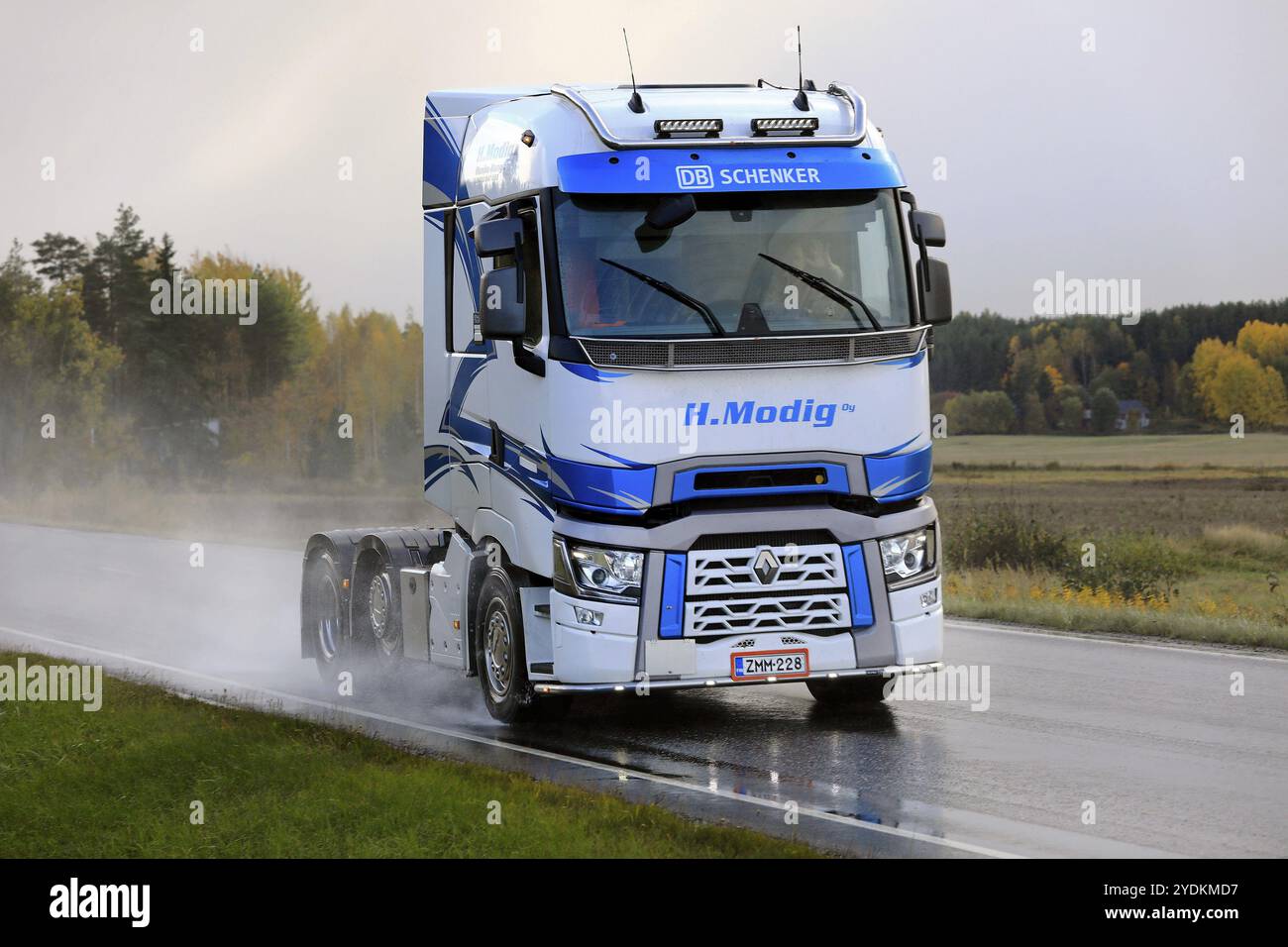 Blue and white Renault Trucks T High lorry of Helmer Modig Oy trucking ...