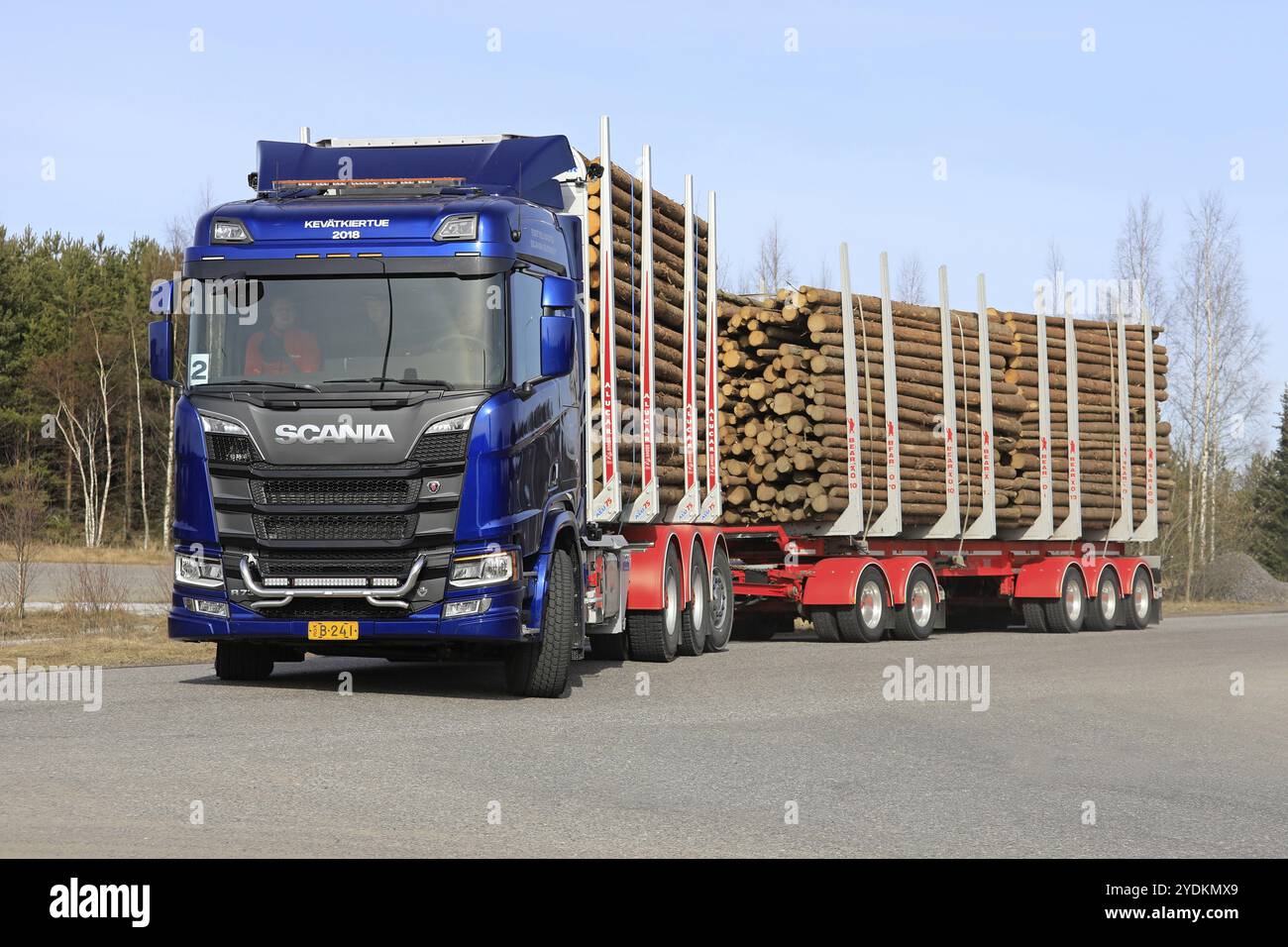 LIETO, FINLAND, APRIL 12, 2018: Blue Scania R730 logging truck makes ...