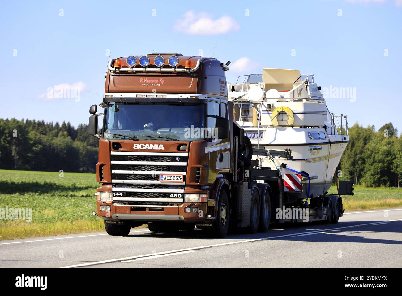 Brown Scania 144 460 semi trailer of P Husonen Ky transports ...