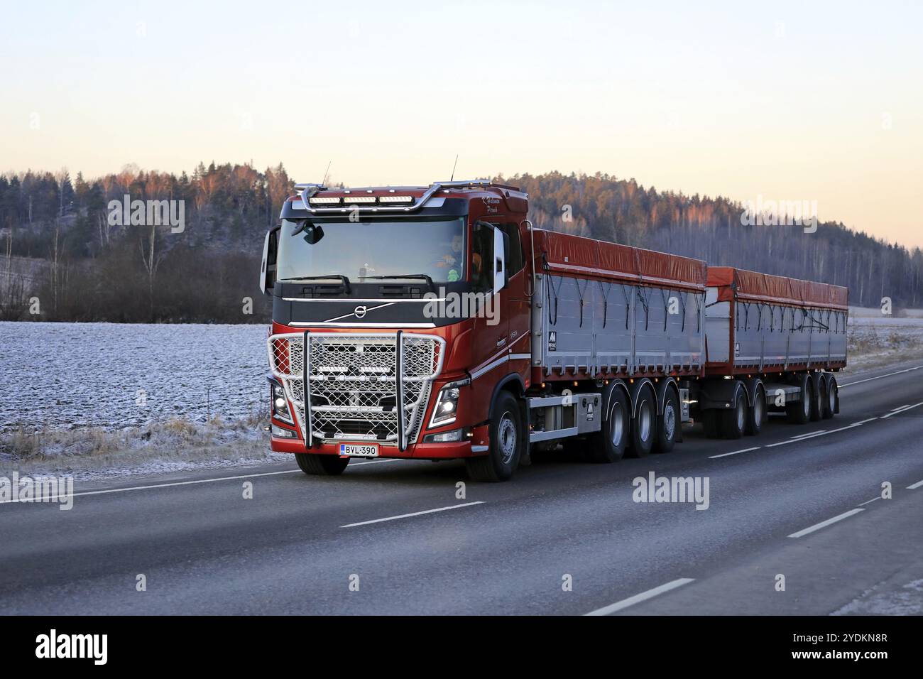 Red Volvo FH16 750 grain transport truck of K Halonen driving on ...