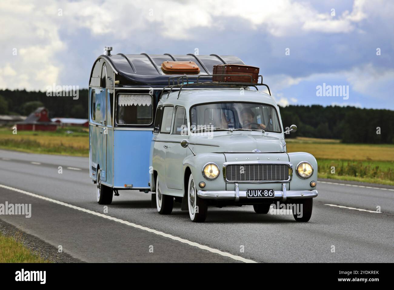 Classic Volvo car PV544, manufactured 1958-65 by Volvo, pulls blue ...