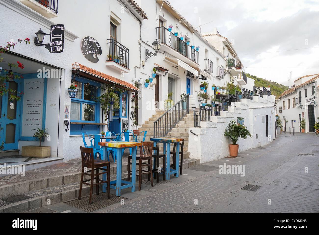 Small empty, bar, cafe terrace, in the white village of Mijas pueblo ...