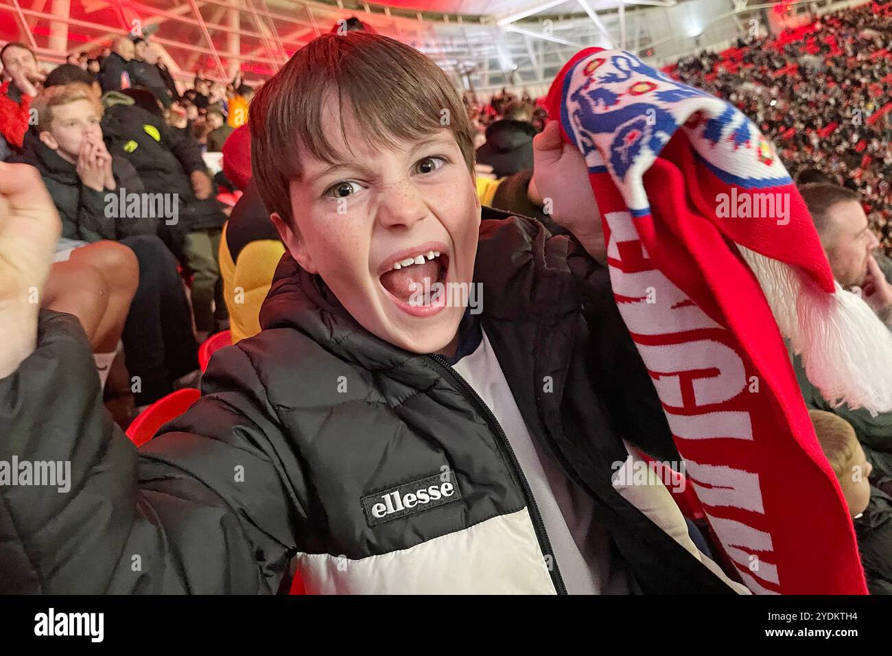 A young England supporter cheers and celebrates during the England v ...