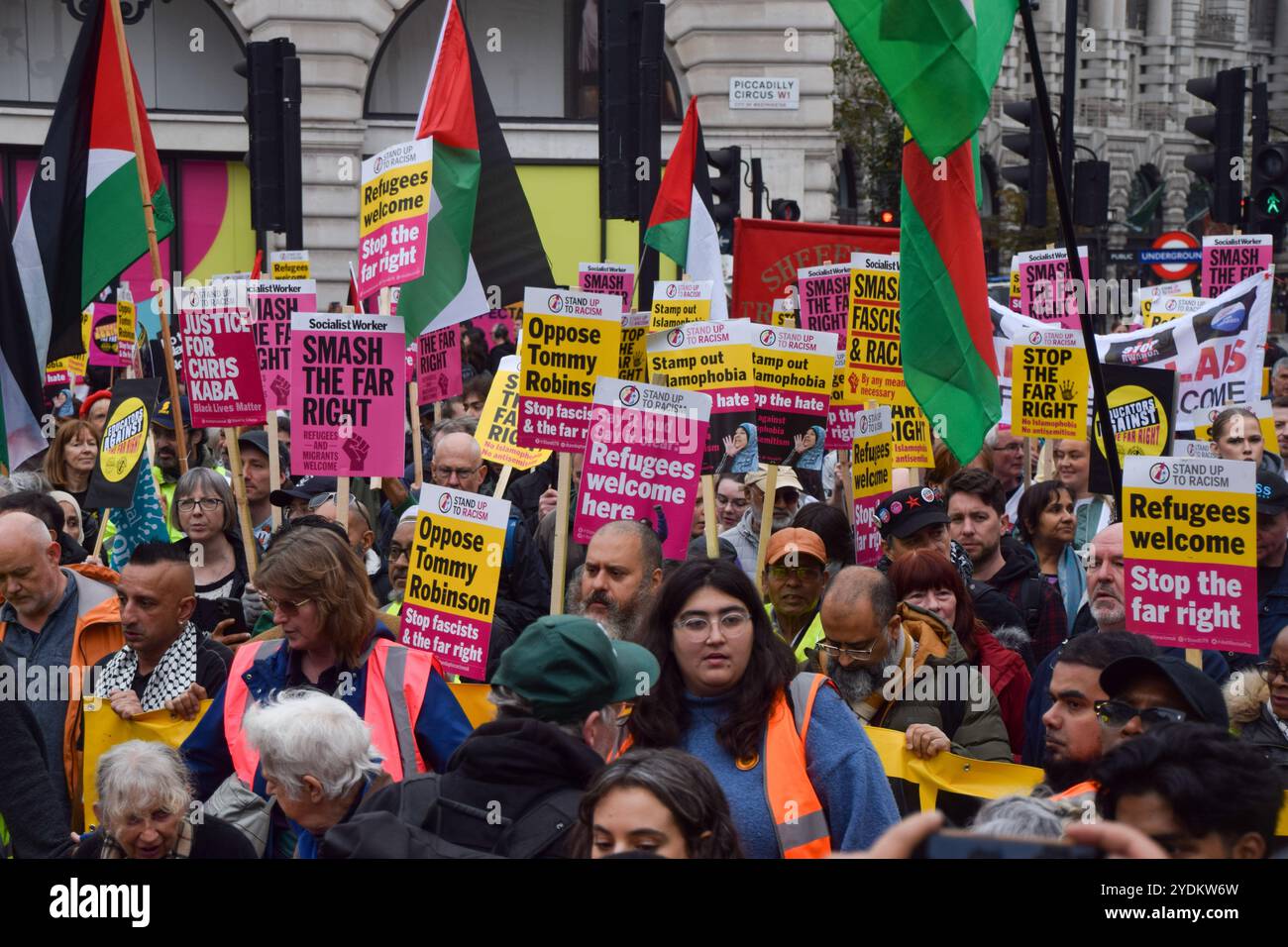 London, England, UK. 26th Oct, 2024. Crowds march in Piccadilly Circus ...