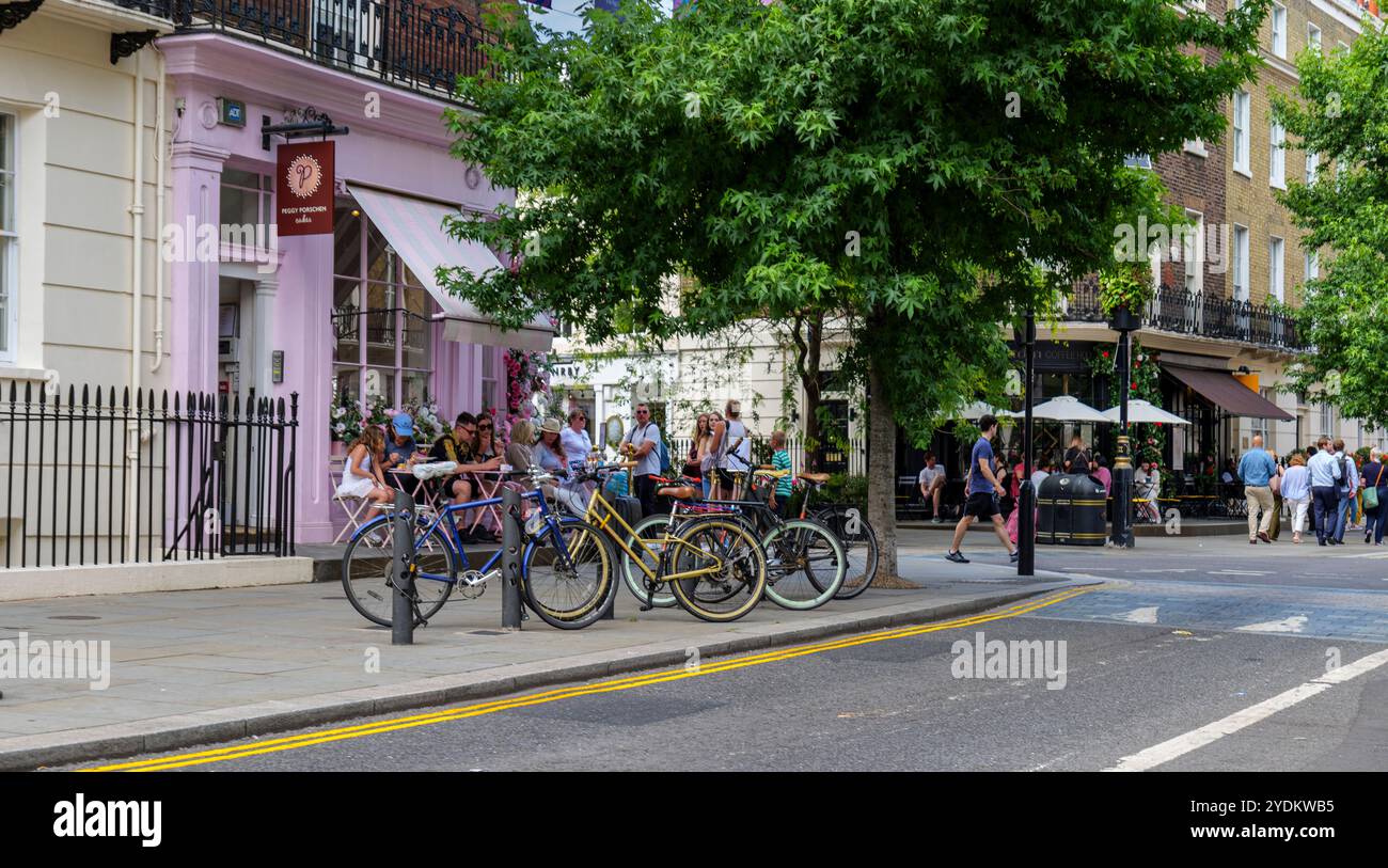 London 06.15.2022: View of Ebury Street with people outside a cafe ...