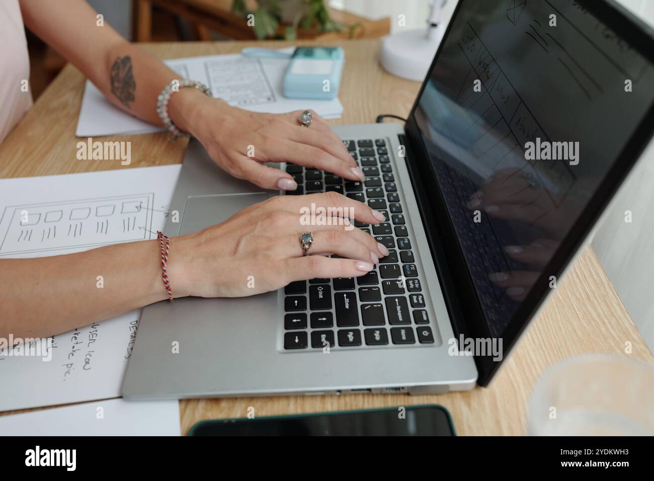 Designing User Interface on Laptop with Focused Hands Stock Photo - Alamy